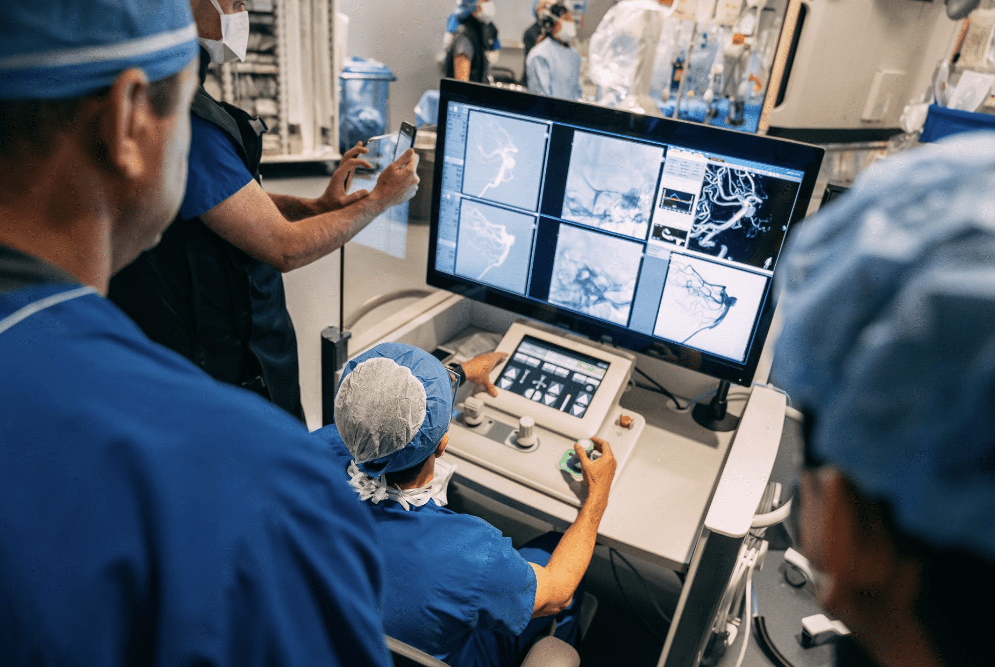 Toronto doctors perform first robot-assisted brain surgery on live ...