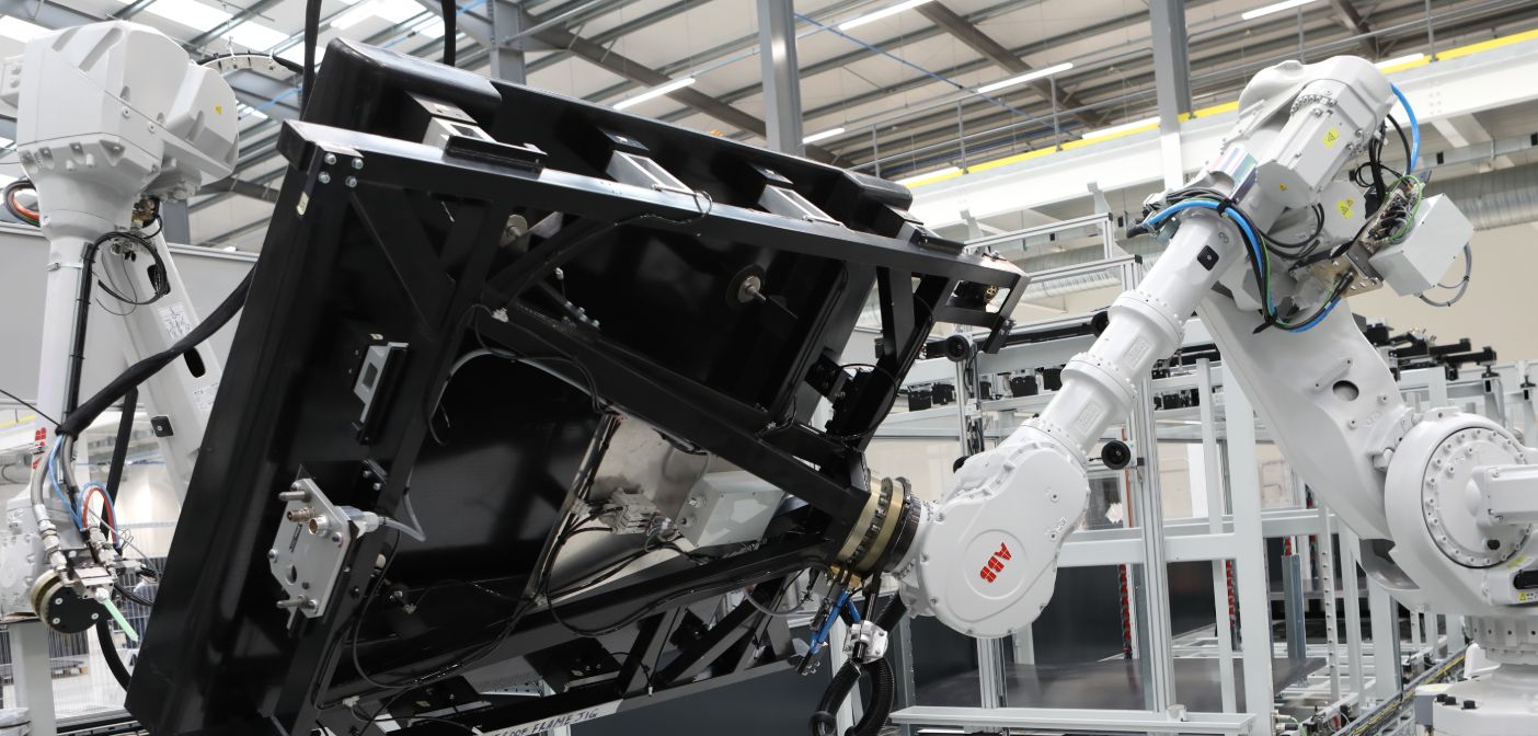 Robotic production line assembles new Asda grocery delivery vans ...