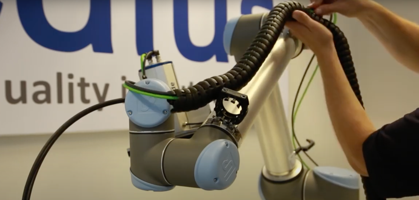 Igus energy chain solution tidies up cables on Universal Robot arm ...